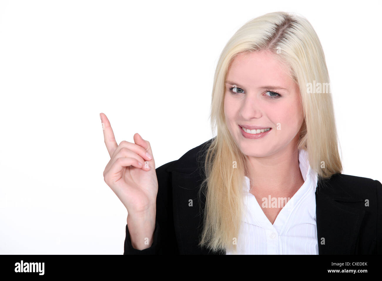 Woman pointing her finger Stock Photo - Alamy