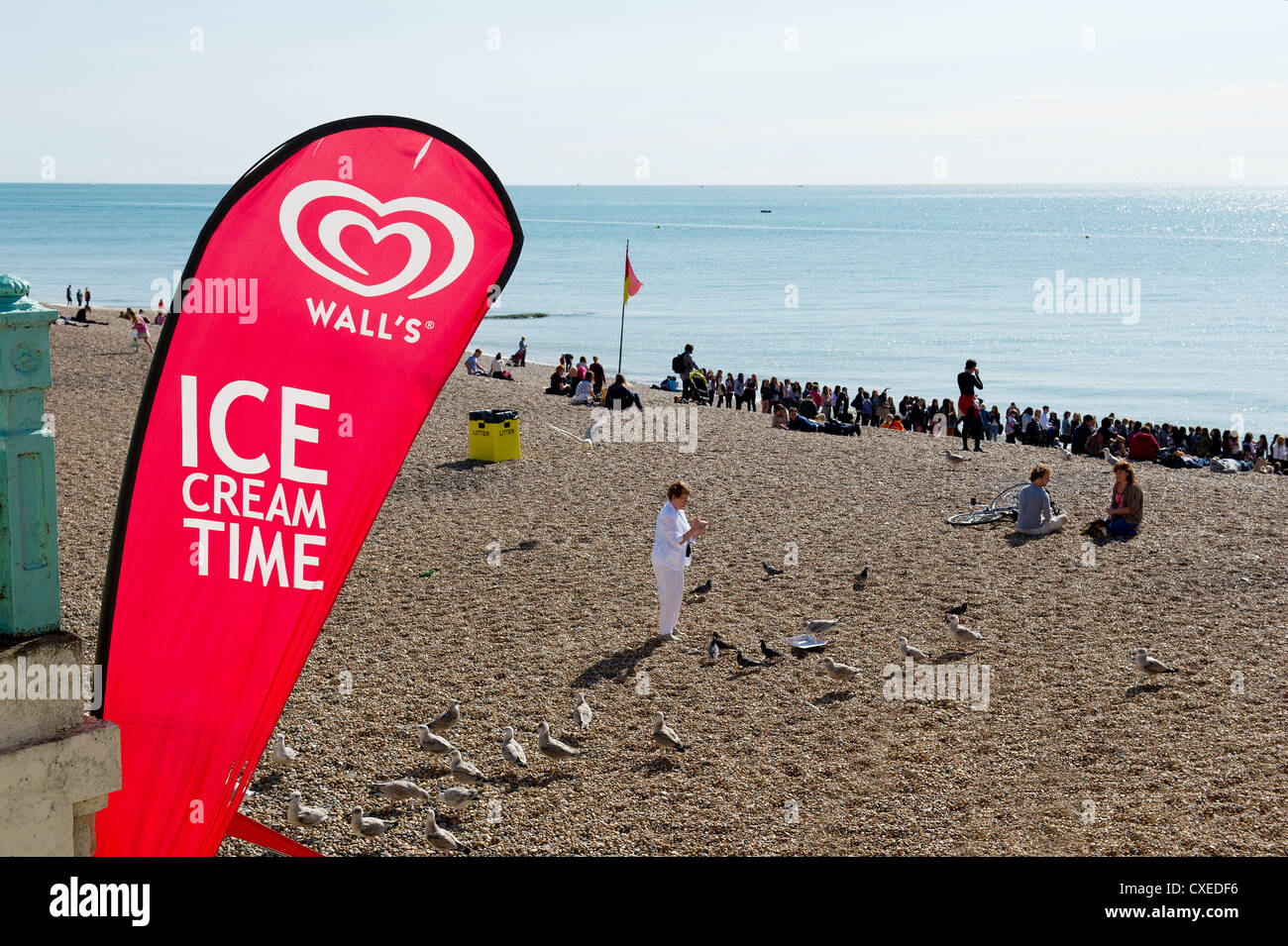 An ice cream sign on Brighton beach Stock Photo - Alamy