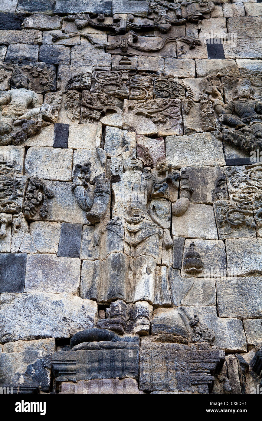 Wall Relief of the Buddhist Temple Candi Mendut in Indonesia Stock ...