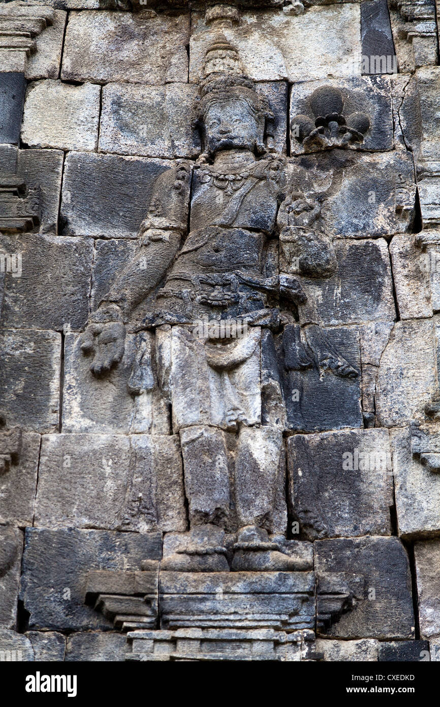 Wall Relief of the Buddhist Temple Candi Mendut in Indonesia Stock ...