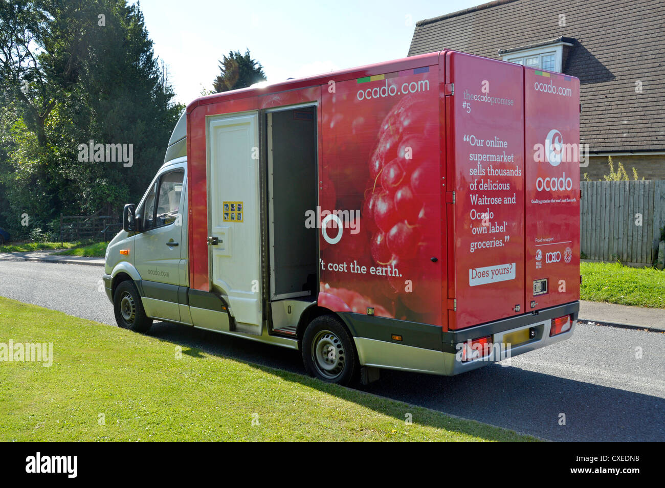 Ocado groceries home delivery van parked in residential turning whilst ...