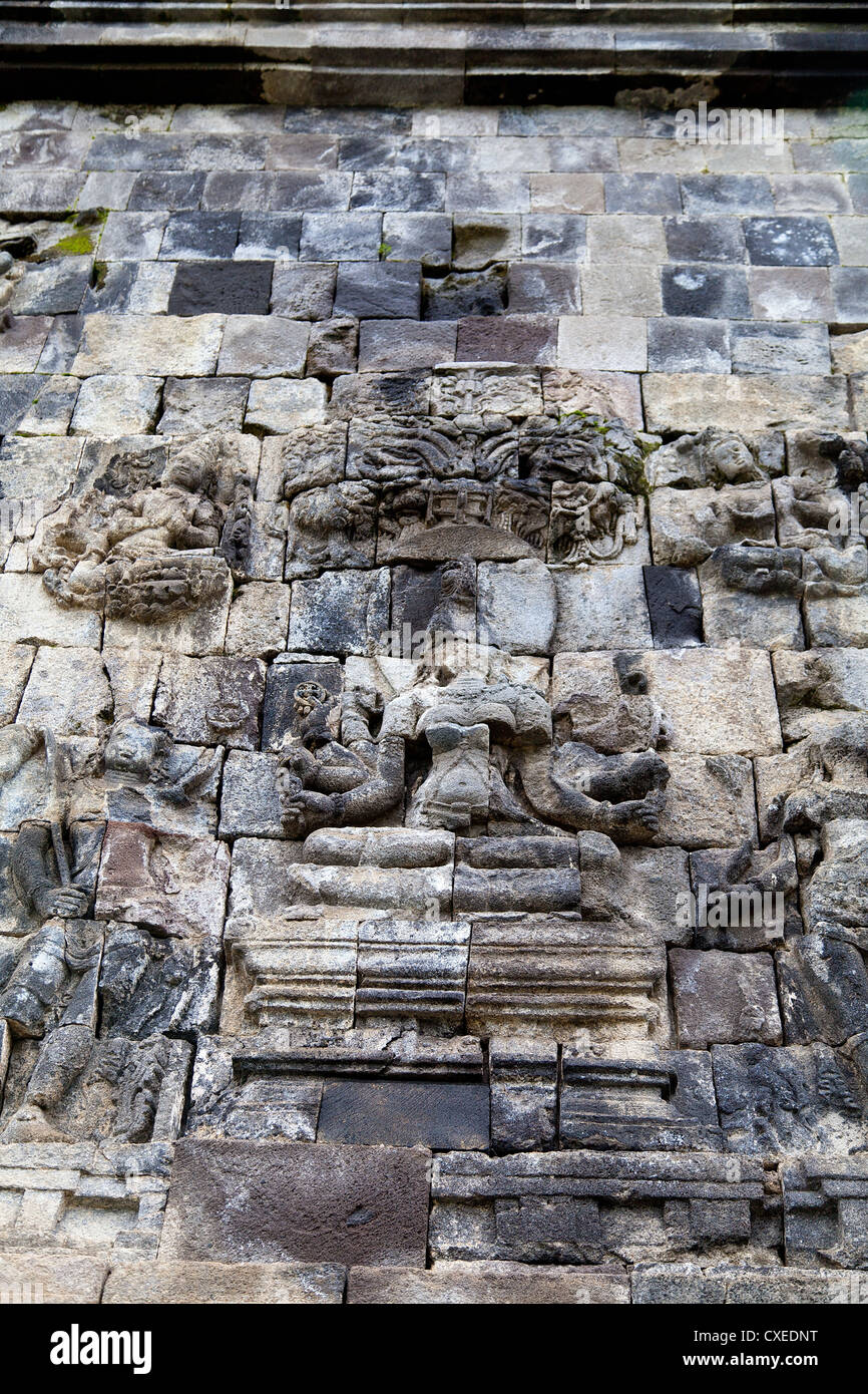 Wall Relief of the Buddhist Temple Candi Mendut in Indonesia Stock ...