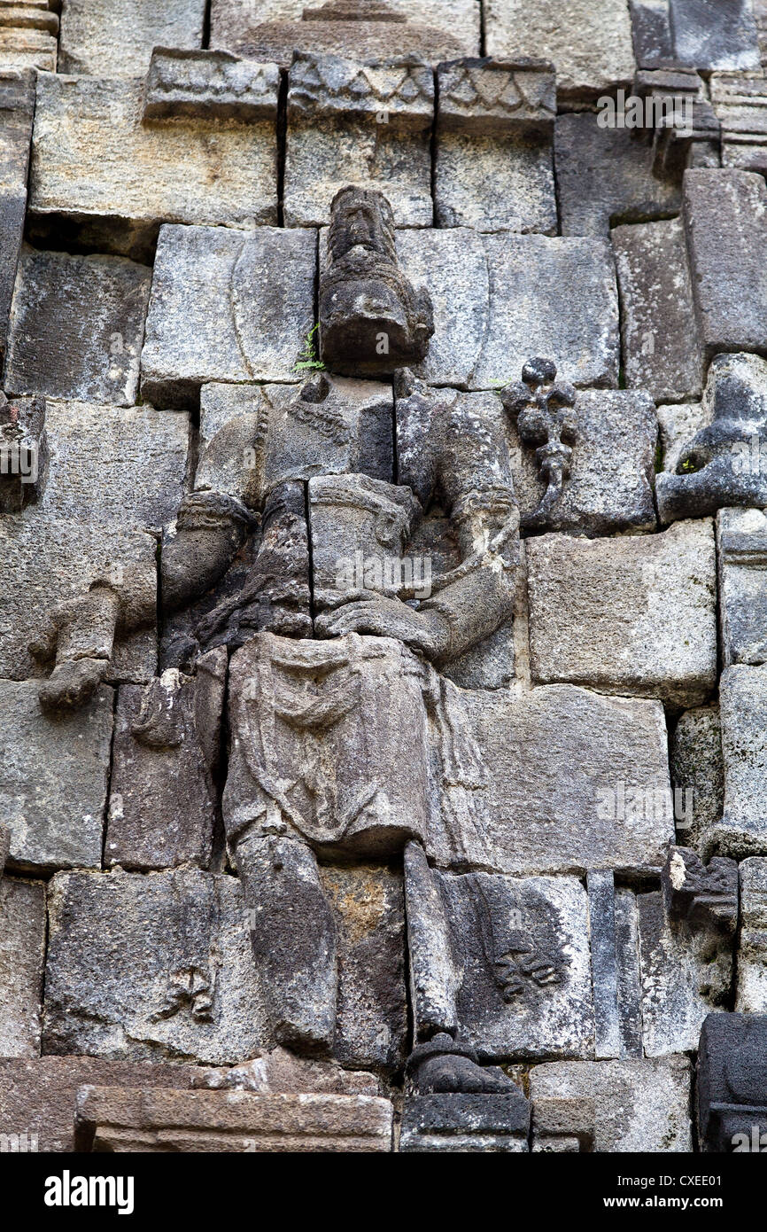 Wall Relief of the Buddhist Temple Candi Mendut in Indonesia Stock ...