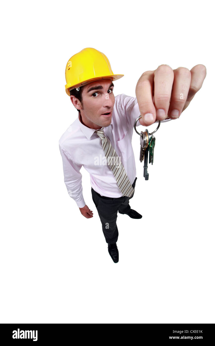 Estate-agent dangling keys Stock Photo - Alamy