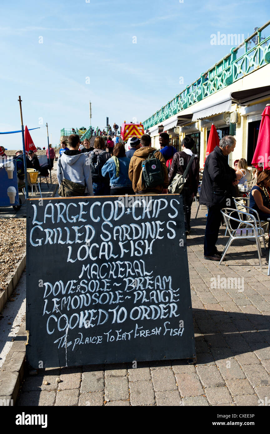 A sign advertising fresh fish on Brighton seafront Stock Photo - Alamy