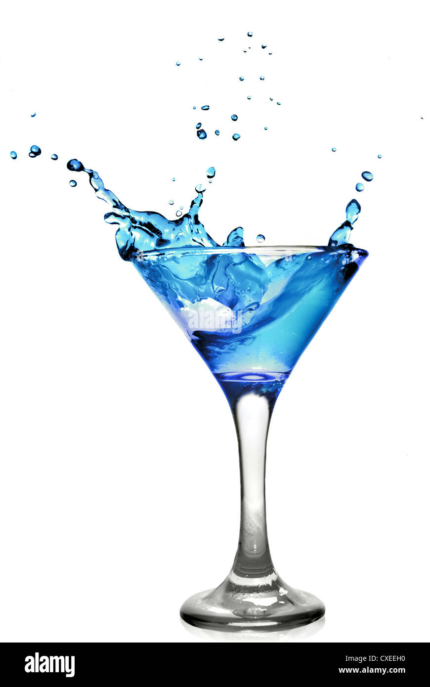 Blue curacao cocktail with splash isolated on white Stock Photo - Alamy