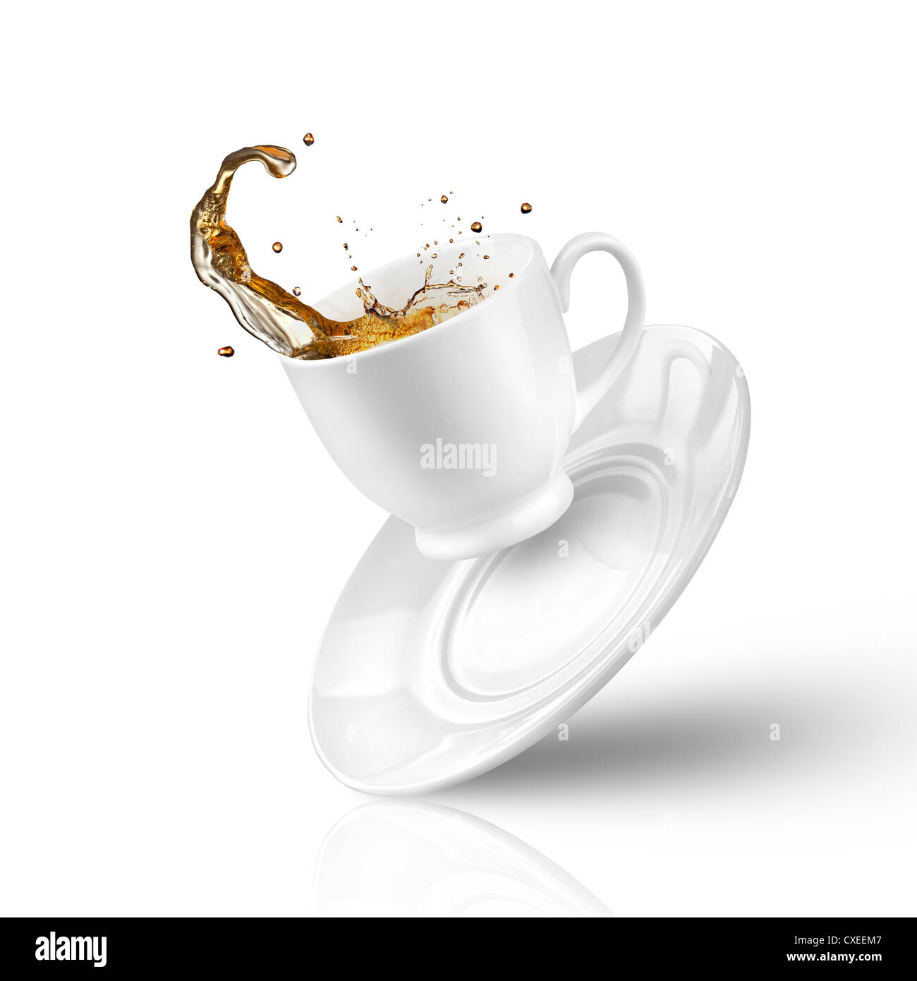 Splash of tea in the falling cup isolated on white Stock Photo - Alamy