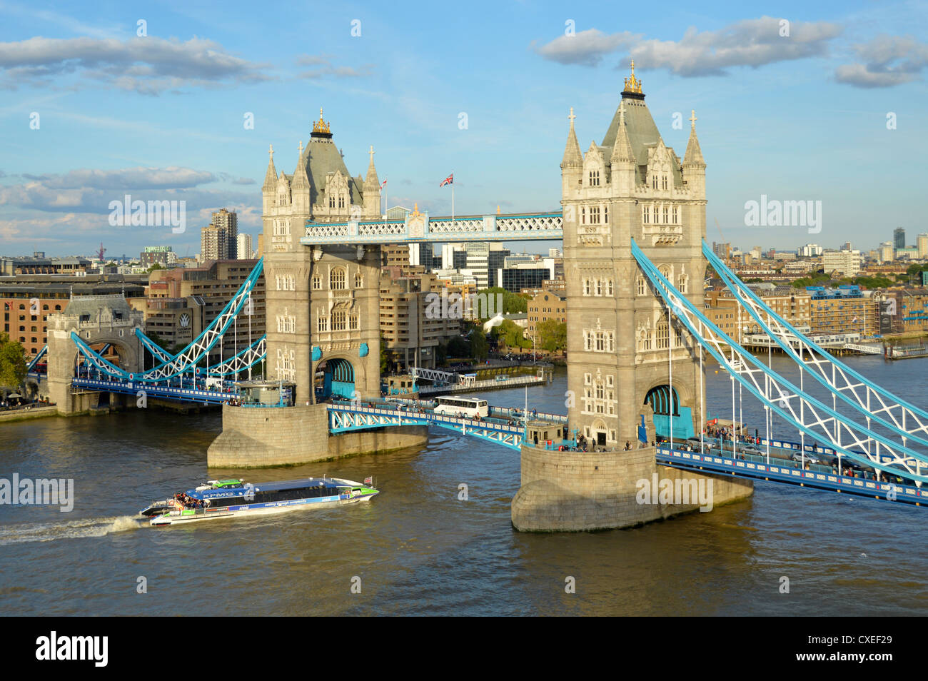 Thames Clipper riverboat commuter and tourist service approaching Tower ...