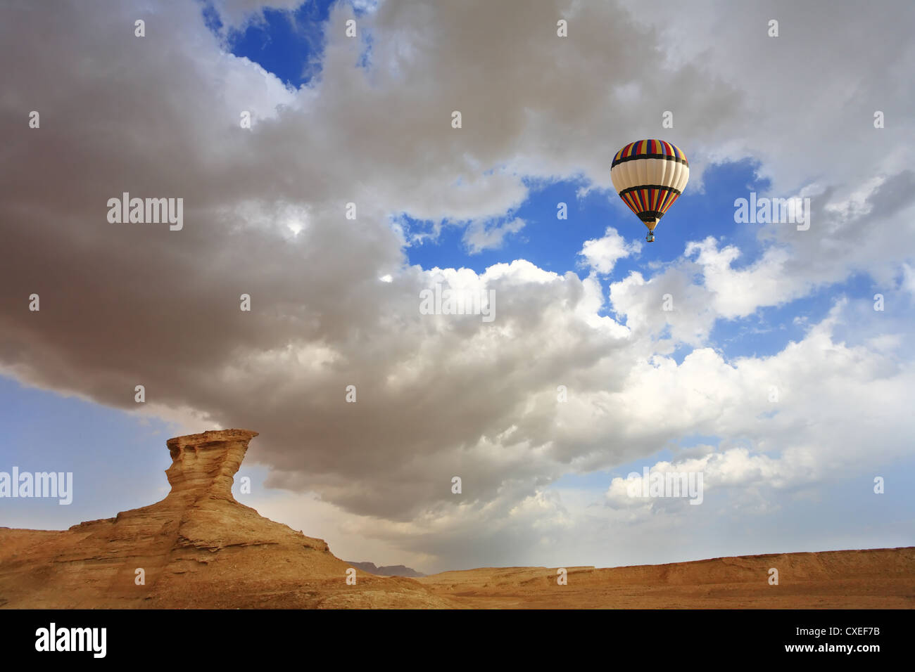 Huge balloon above mountains Stock Photo - Alamy