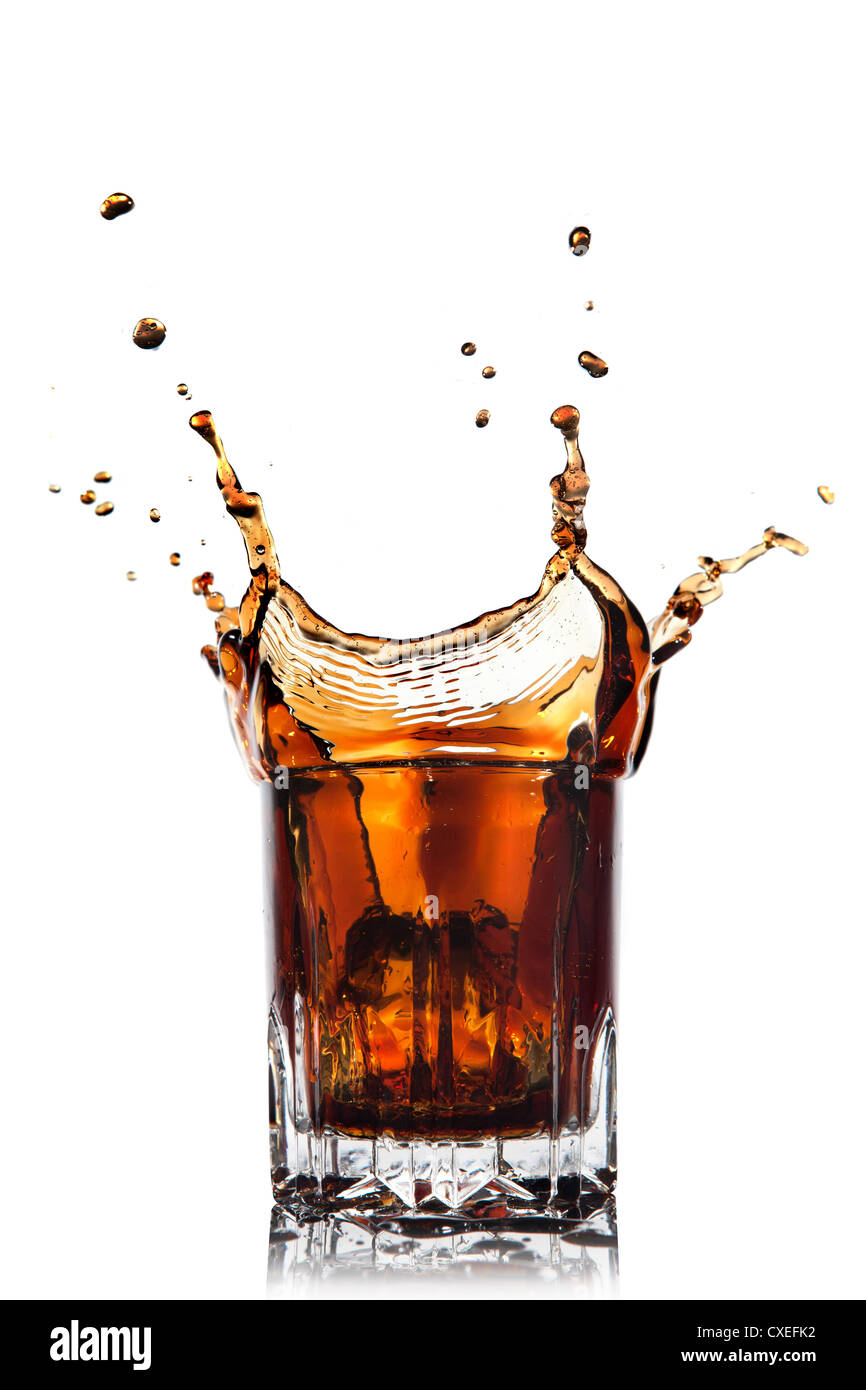 splash of cola in glass isolated on white Stock Photo - Alamy