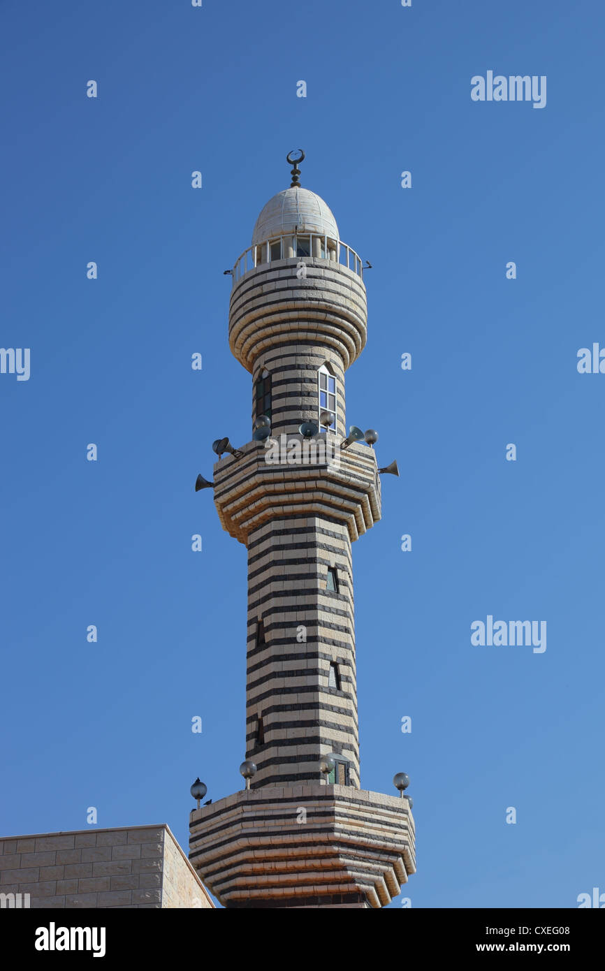 Slender ornate minaret Stock Photo - Alamy