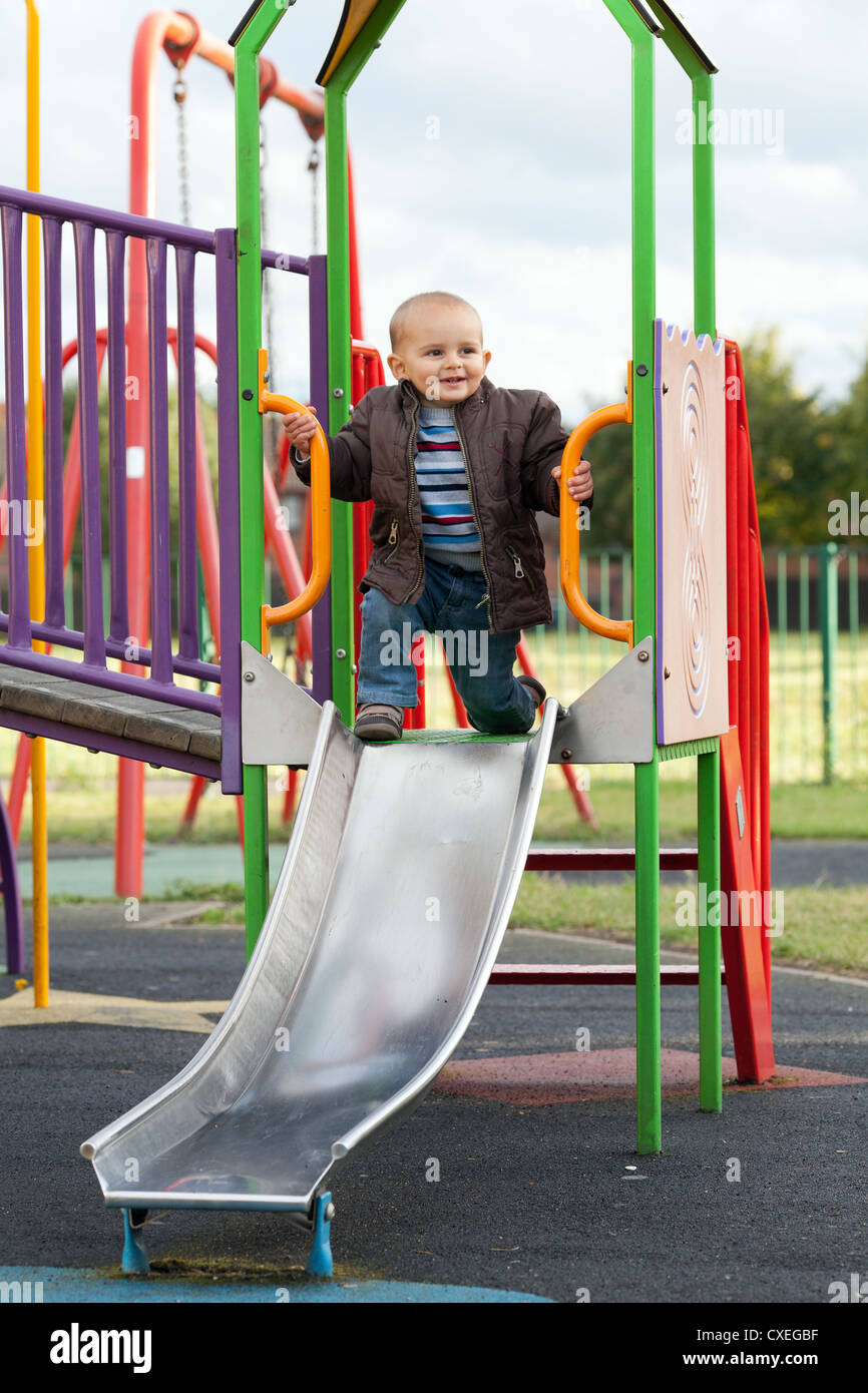 Cute baby boy on the playground Stock Photo - Alamy