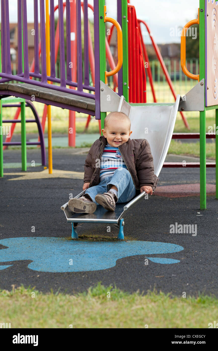 Cute baby boy on the playground Stock Photo - Alamy