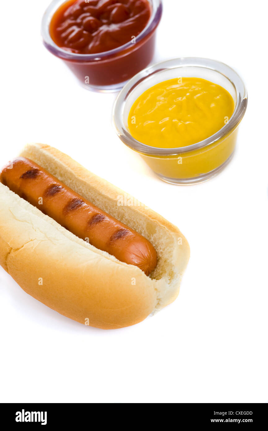 A hot dog with ketchup and mustard on a white background Stock Photo ...