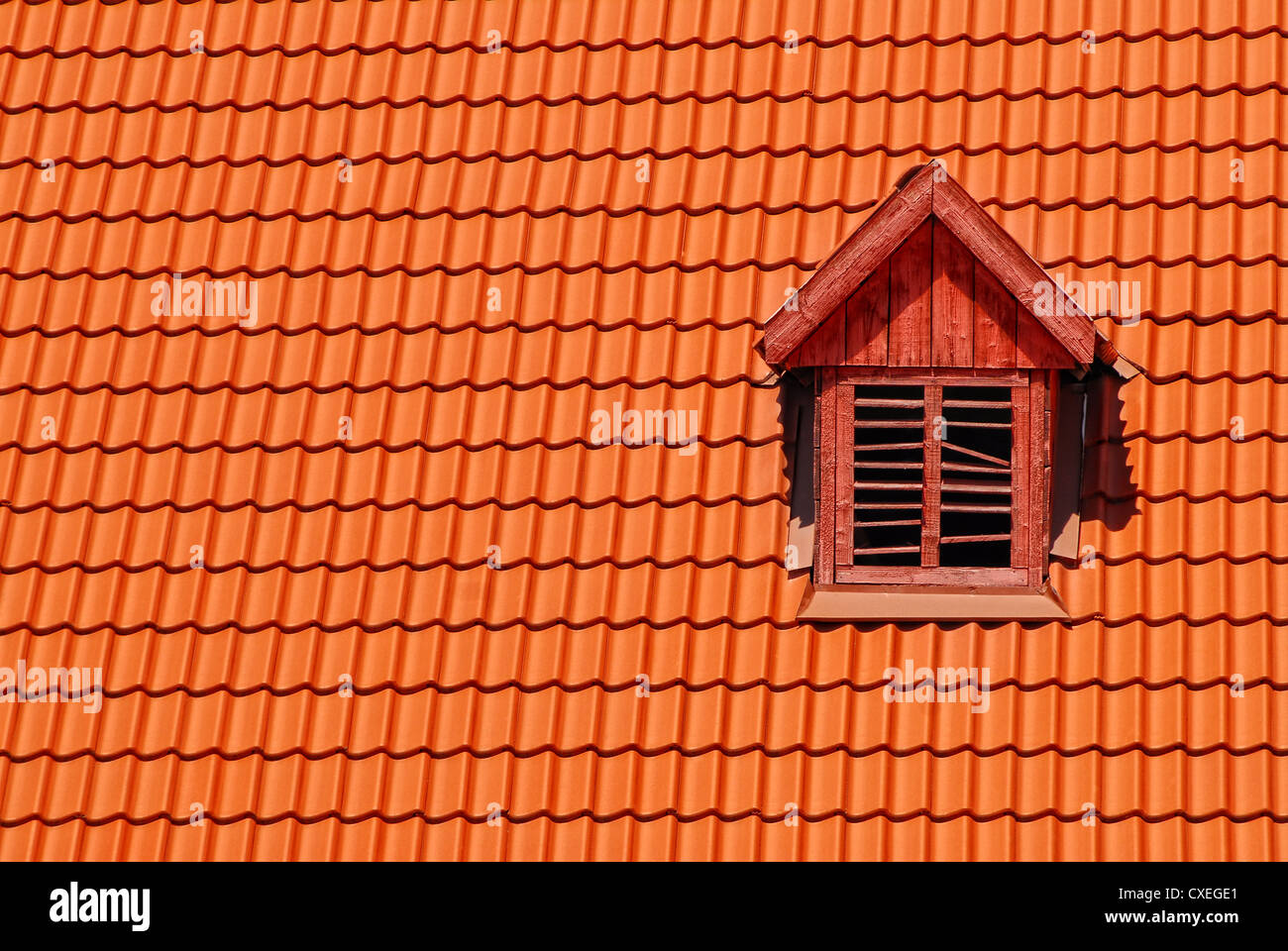 orange roof with window Stock Photo - Alamy