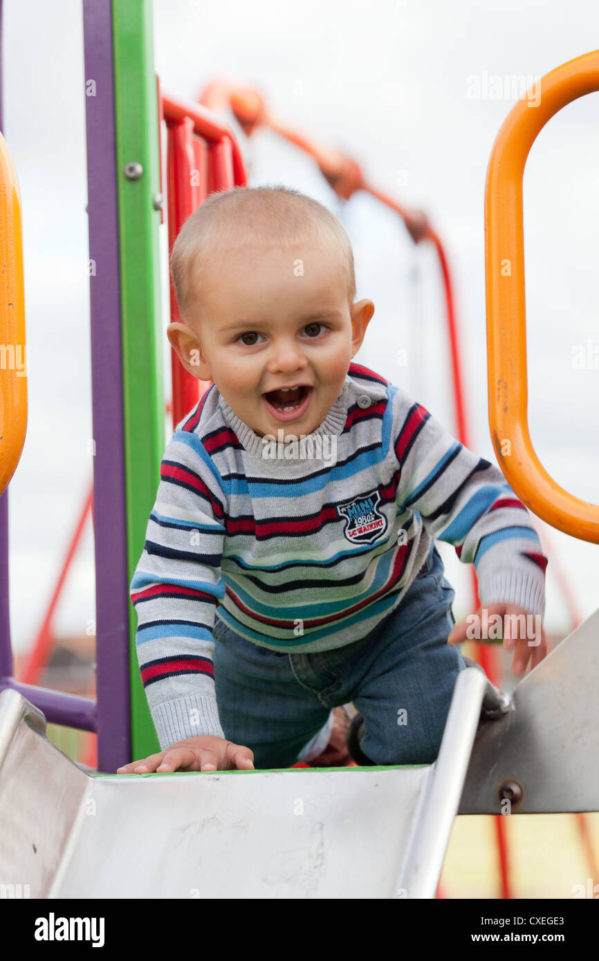 Cute baby boy on the playground Stock Photo - Alamy