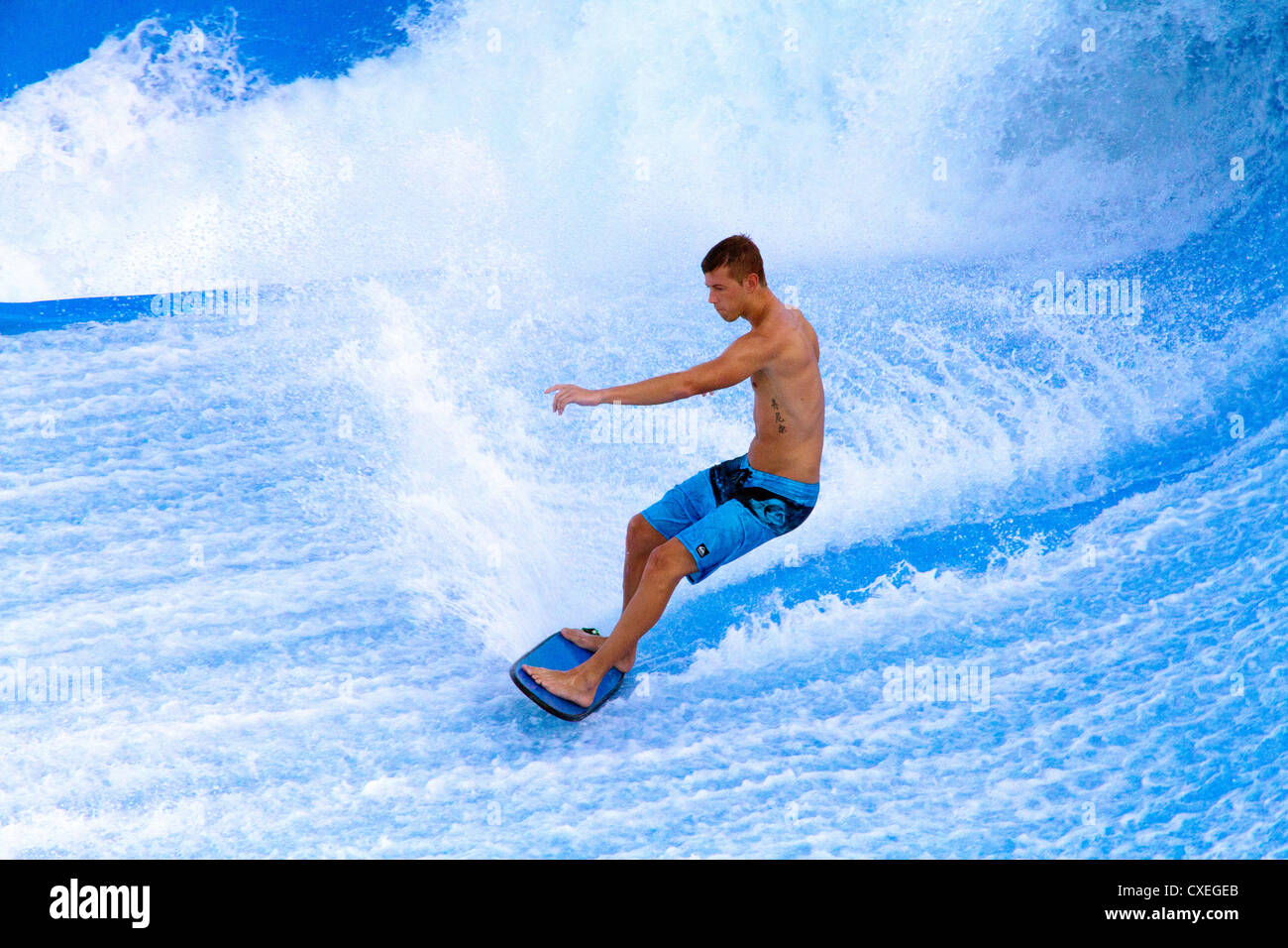 Surfer enjoy surfing on artificial wave at "Wave House" Magaluf ...