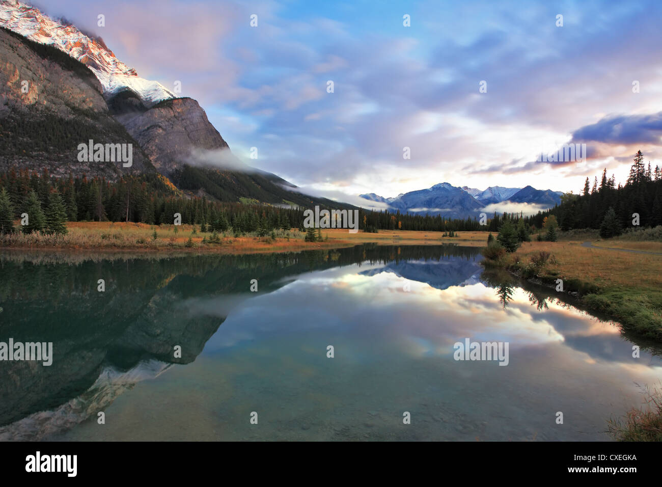 The blue cold lake and snow mountains in Canada Stock Photo - Alamy