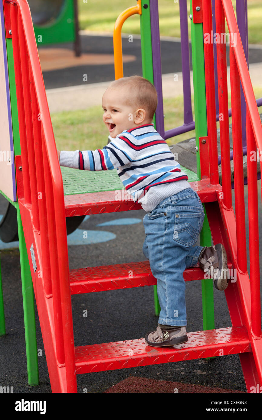 Cute baby boy on the playground Stock Photo - Alamy