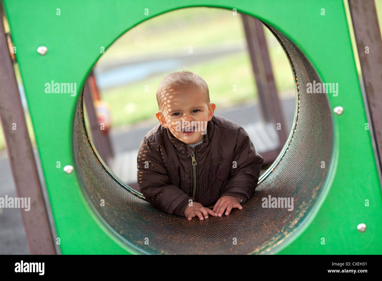 Cute baby boy on the playground Stock Photo - Alamy
