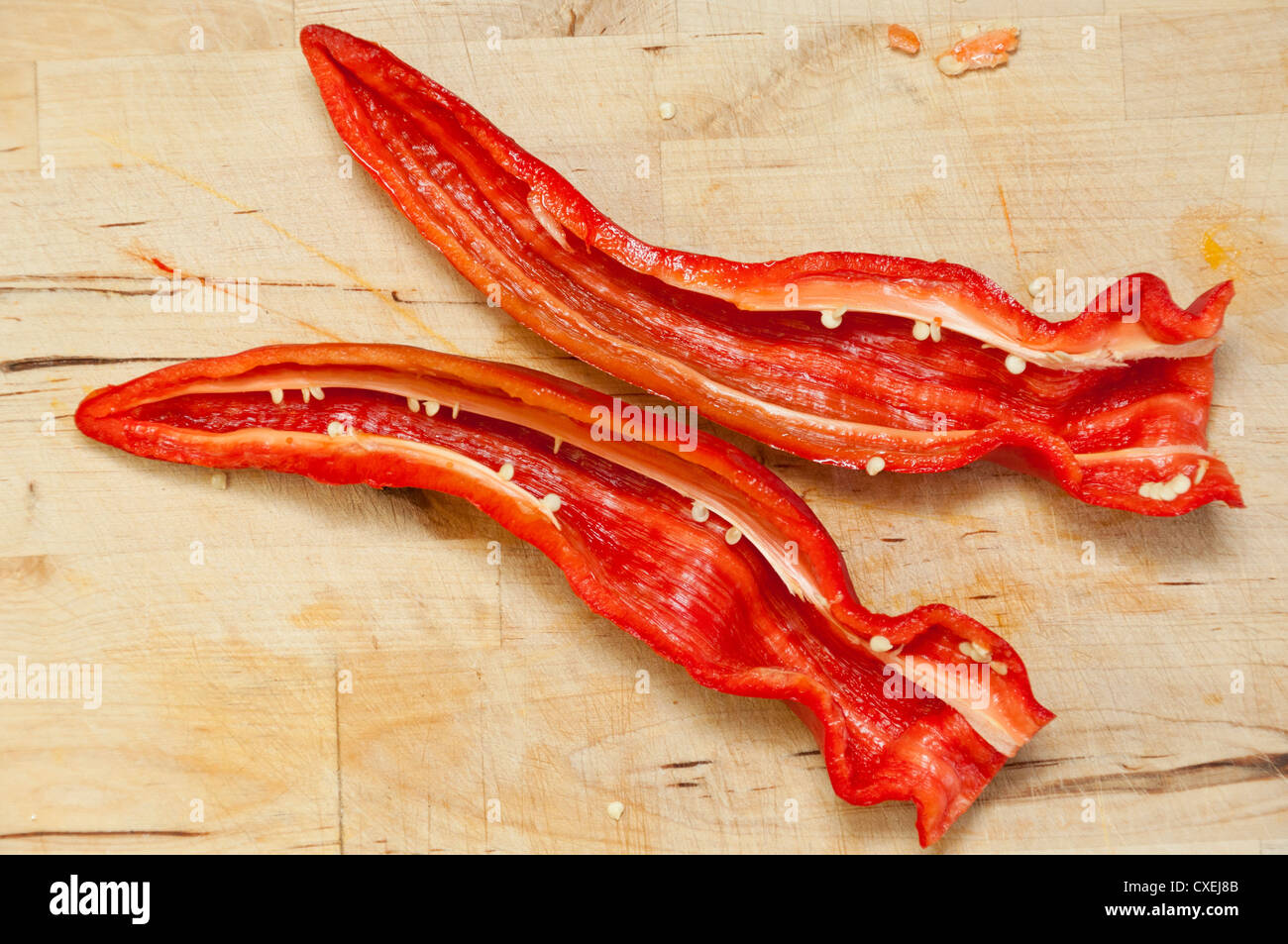 Red chilli pepper sliced in half Stock Photo - Alamy