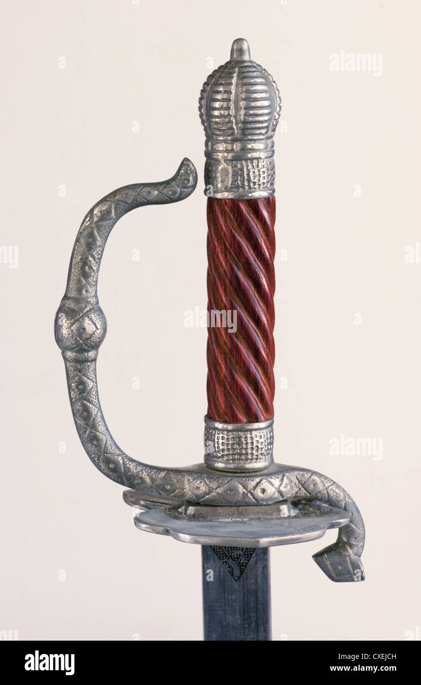 Serpent handle sword or hilt Stock Photo - Alamy
