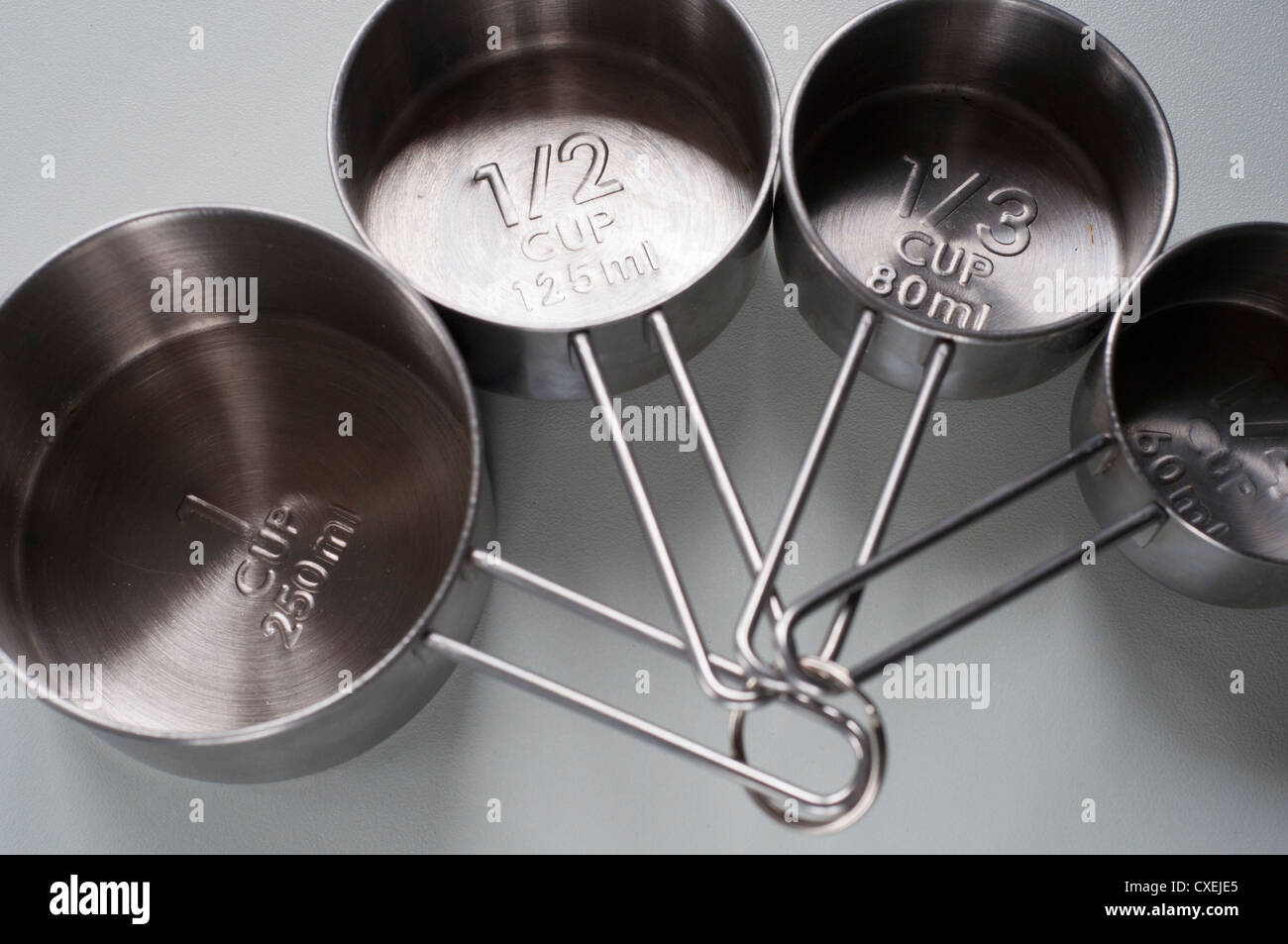 Measuring cups units for cooking Stock Photo - Alamy