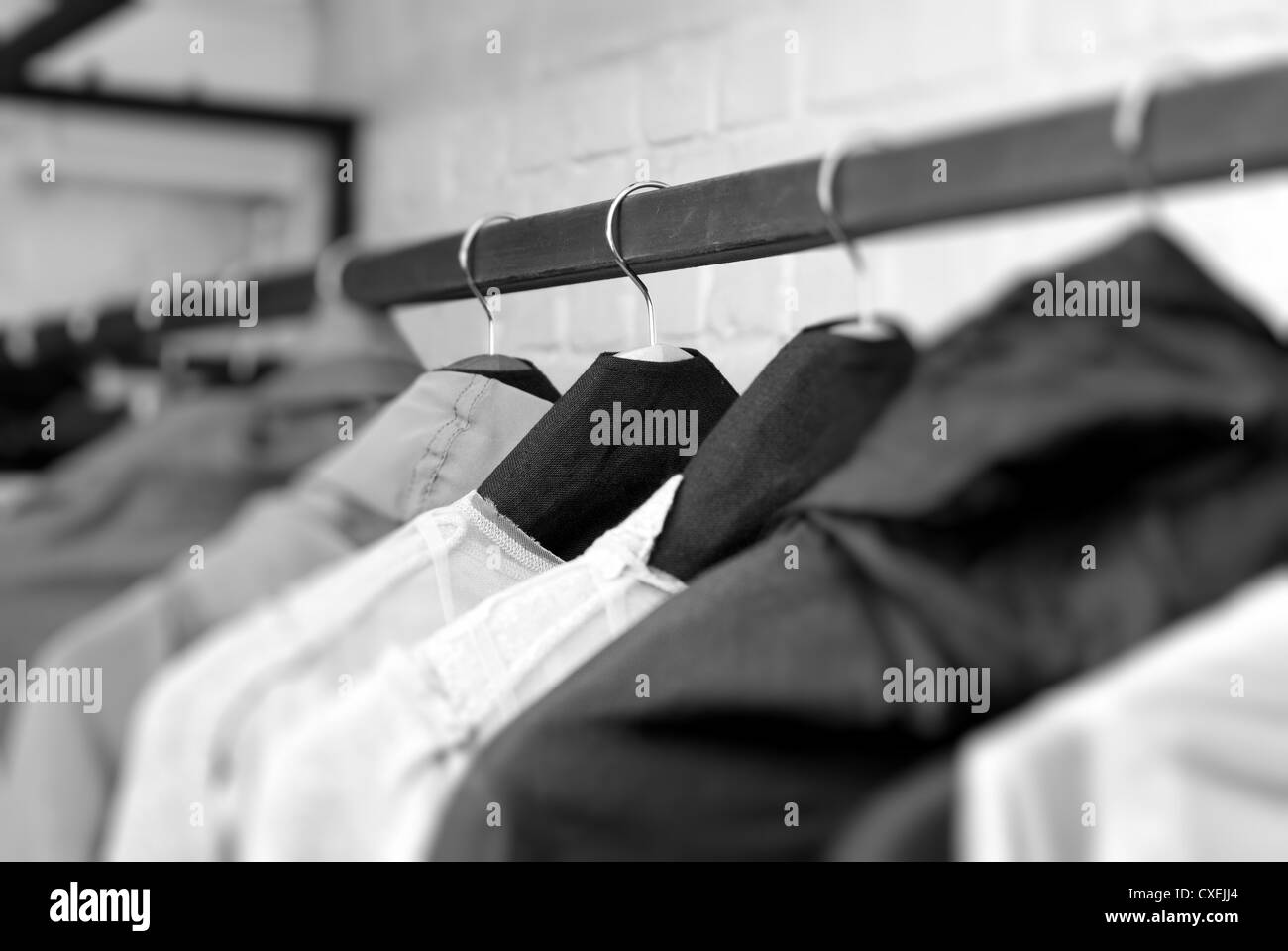 Clothing racks retail display Black and White Stock Photos & Images - Alamy