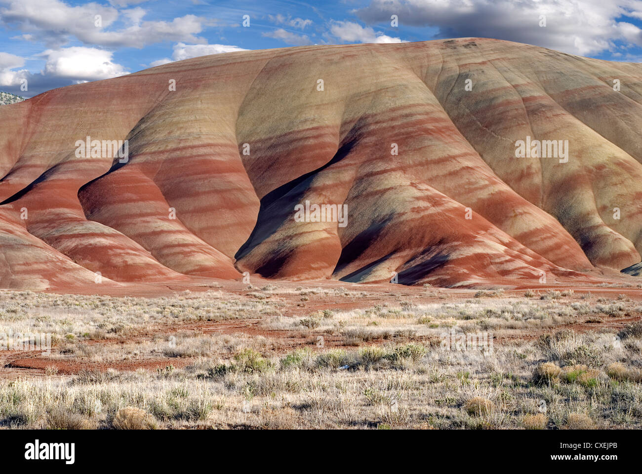 Horizontal landscape of the colorful Painted Hills in Oregon aganist ...