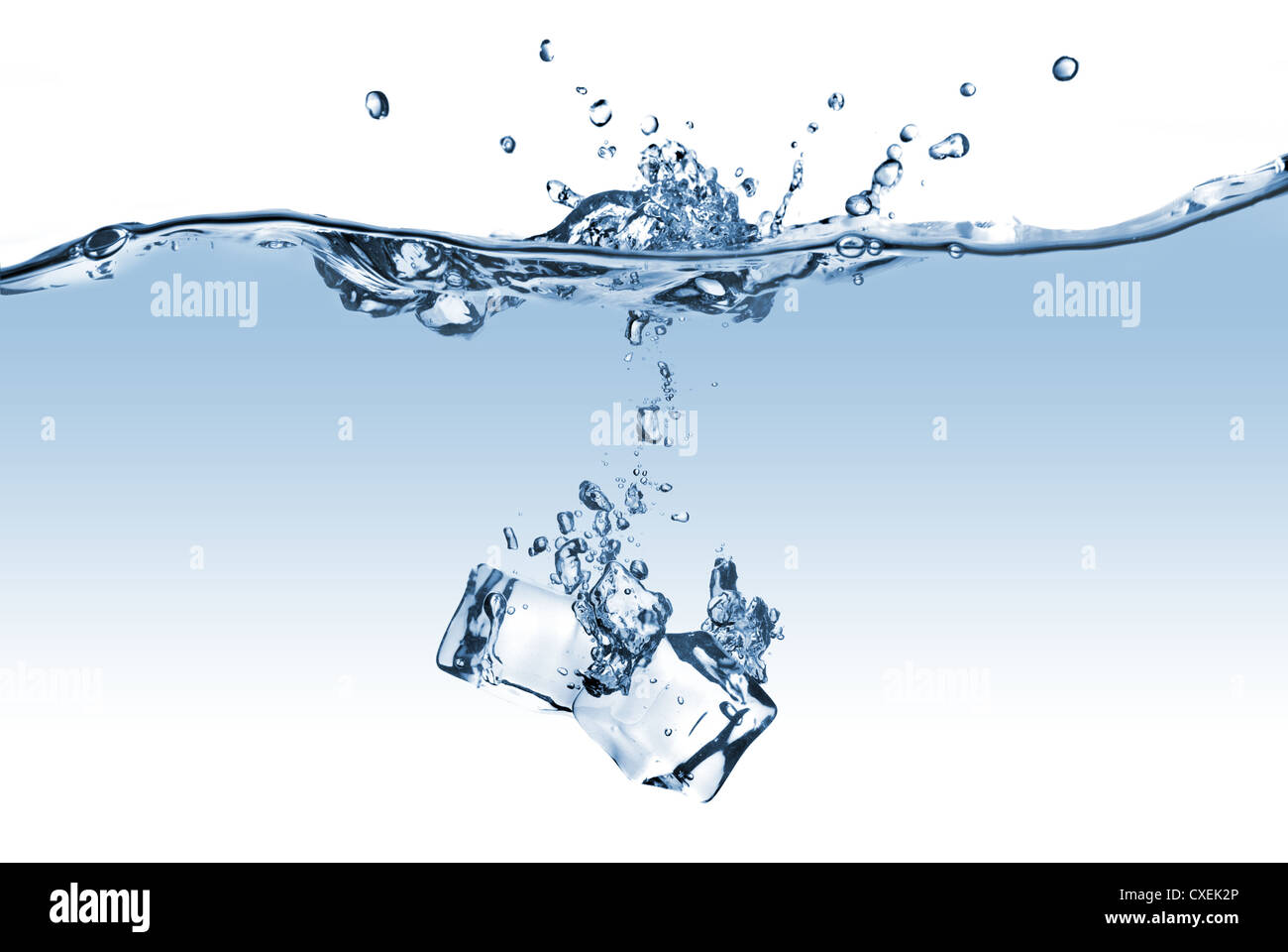 ice cubes dropped into water with splash isolated on white Stock Photo - Alamy