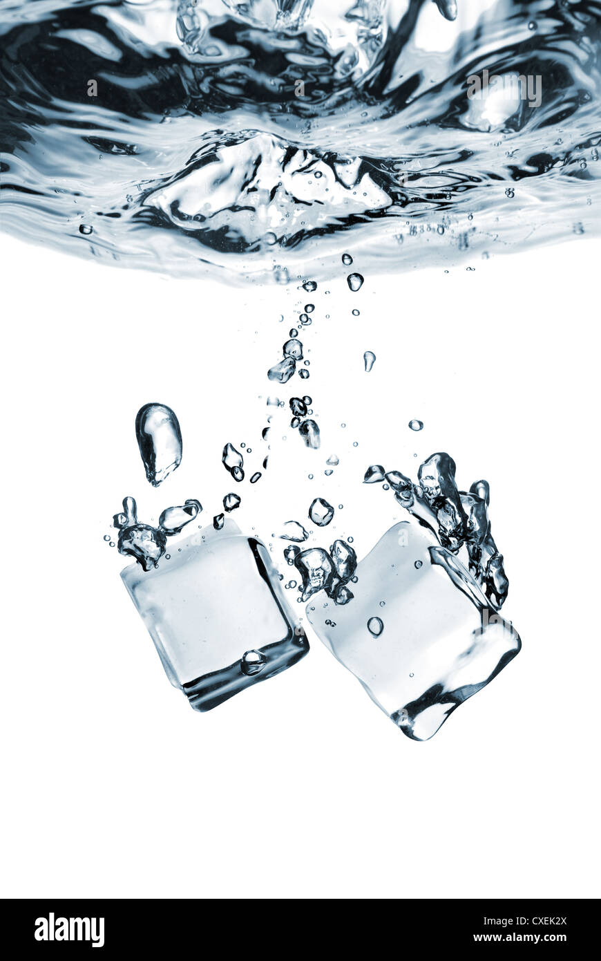 ice cubes dropped into water with splash isolated on white Stock Photo - Alamy