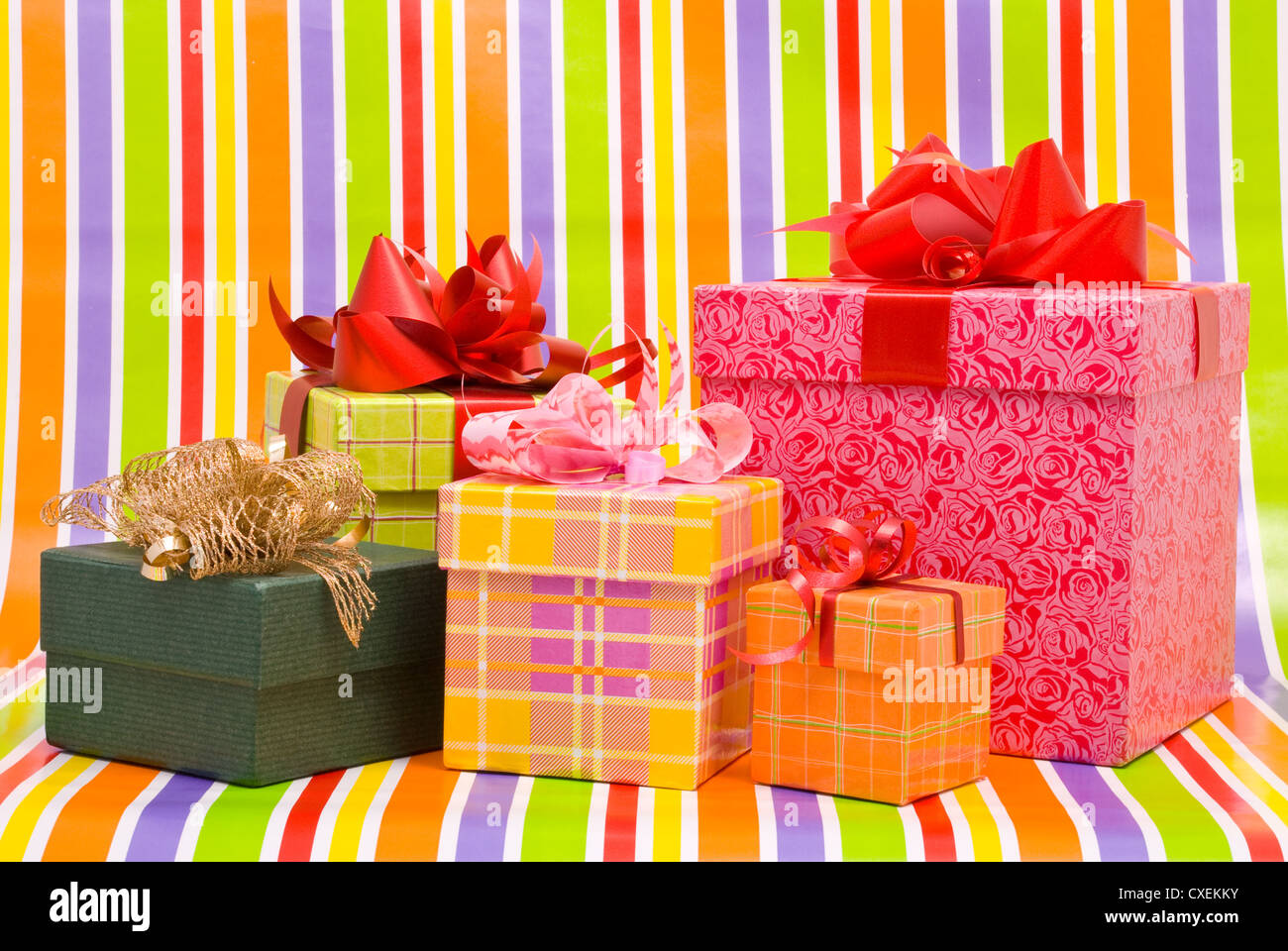 Gift boxes on a stripe background Stock Photo - Alamy
