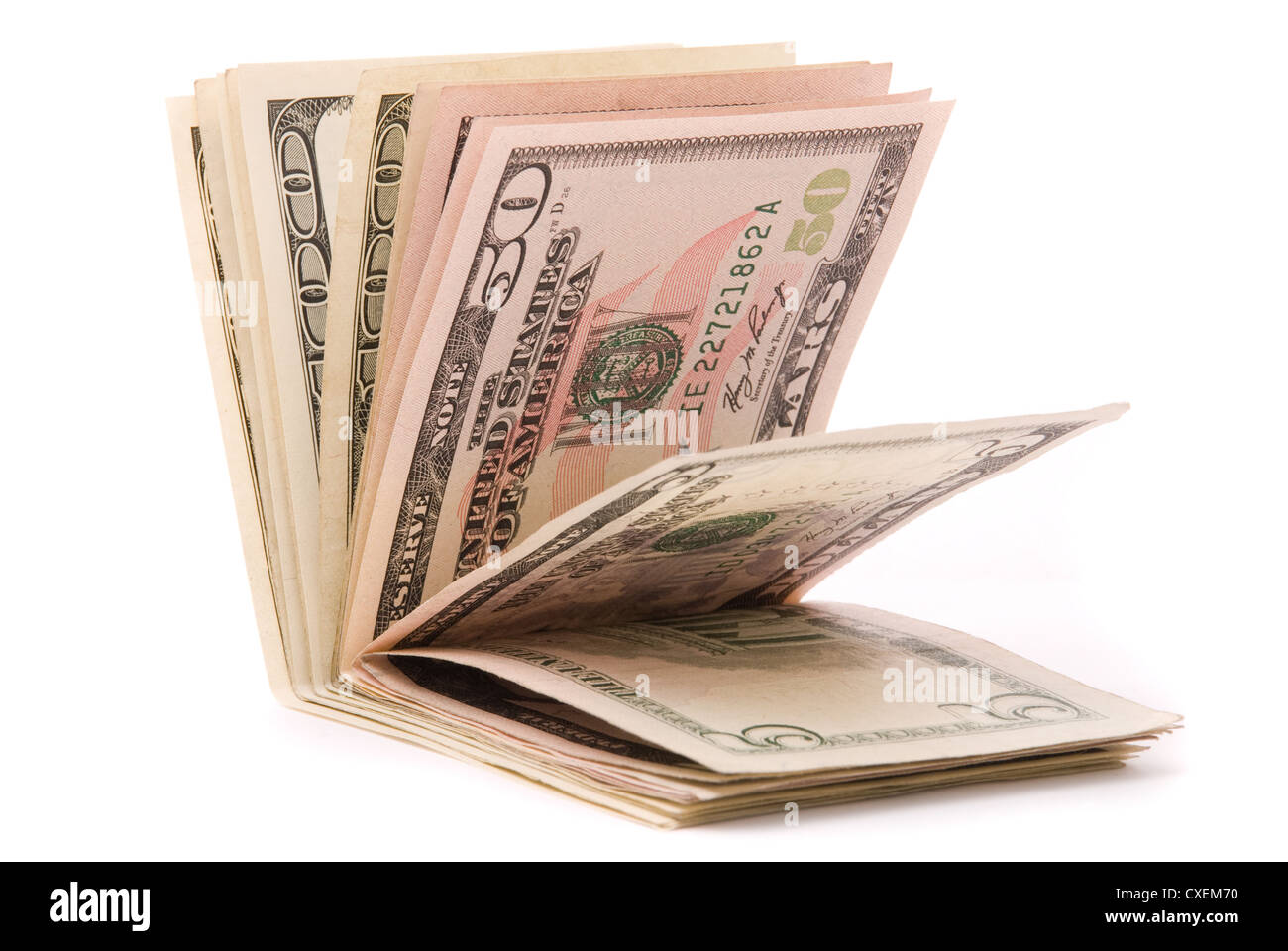 Stack of dollars isolated on the white Stock Photo - Alamy