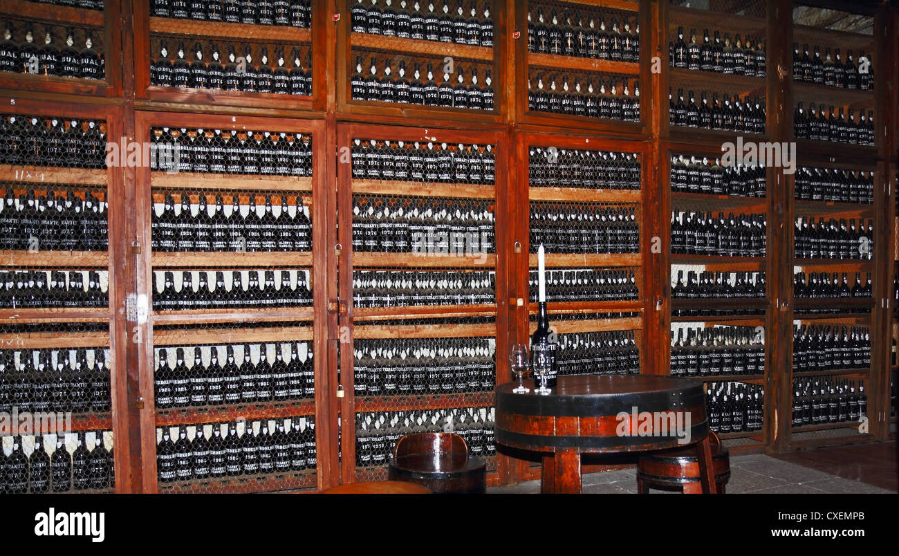 Round table with a bottle Stock Photo - Alamy