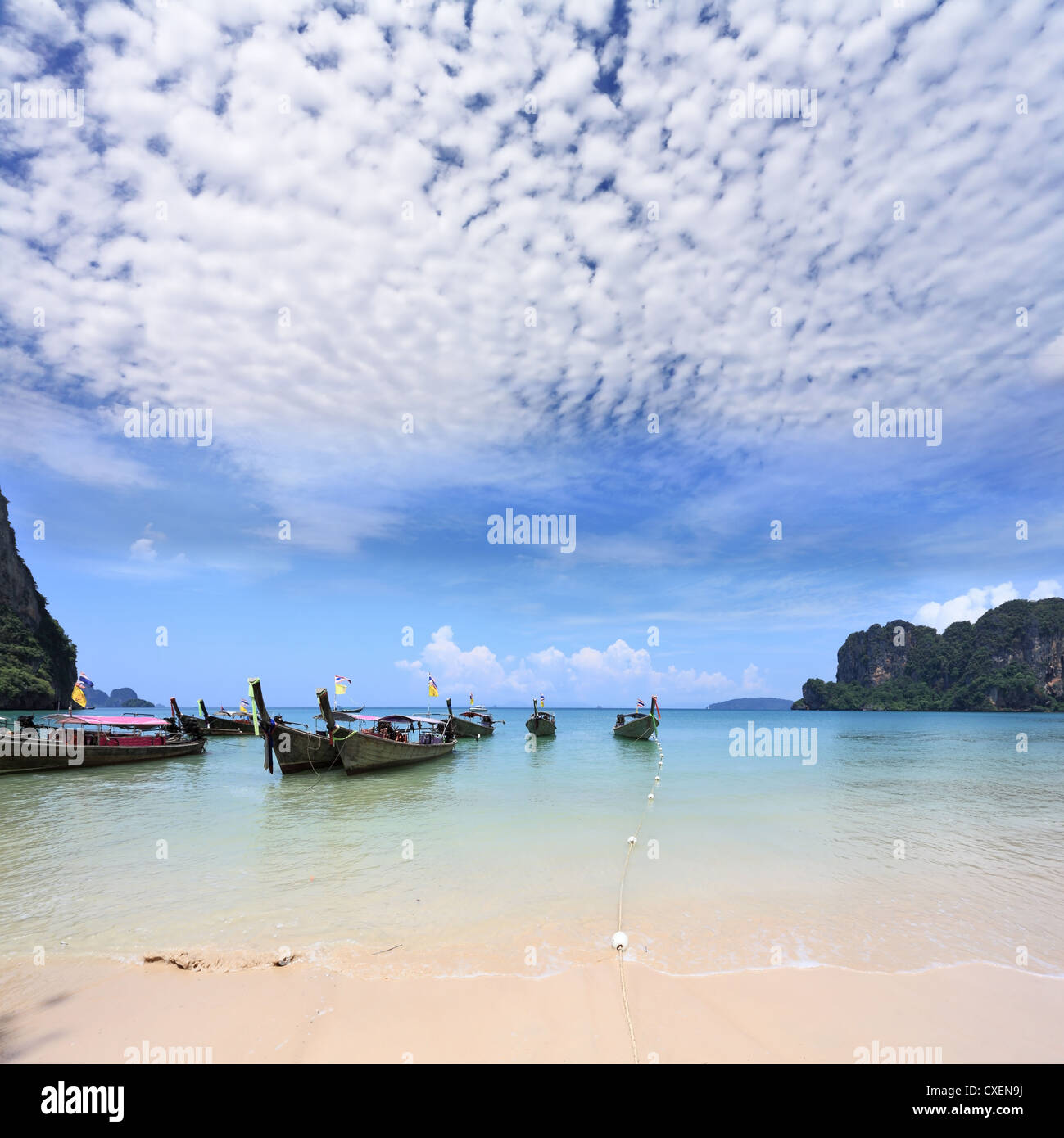 Light cirrus clouds over the warm sea Stock Photo - Alamy