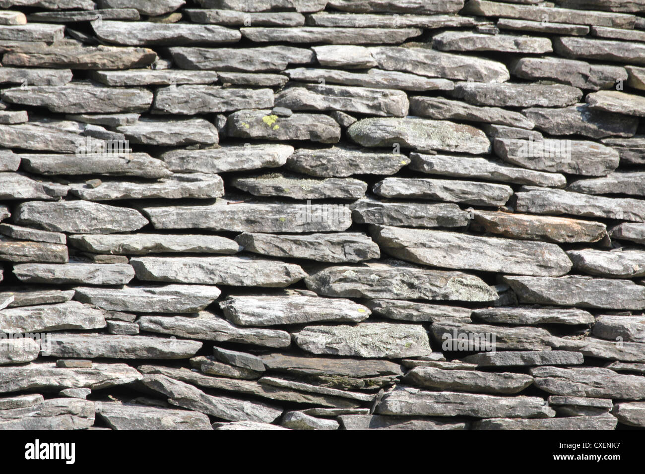 Construction of a wall with gneiss Stock Photo - Alamy