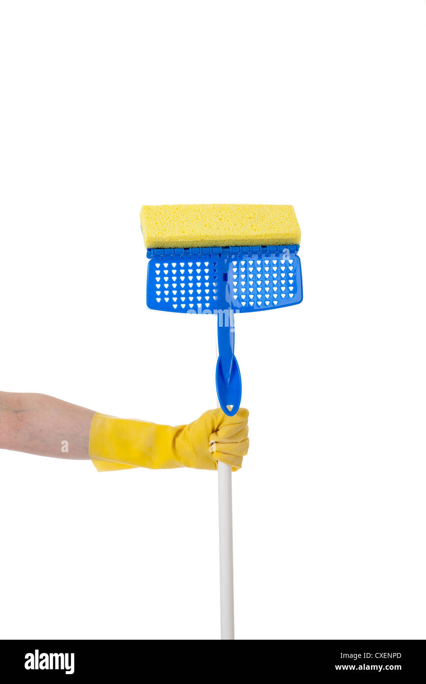 A woman's hand holding a mop with a yellow rubber glove on a white ...