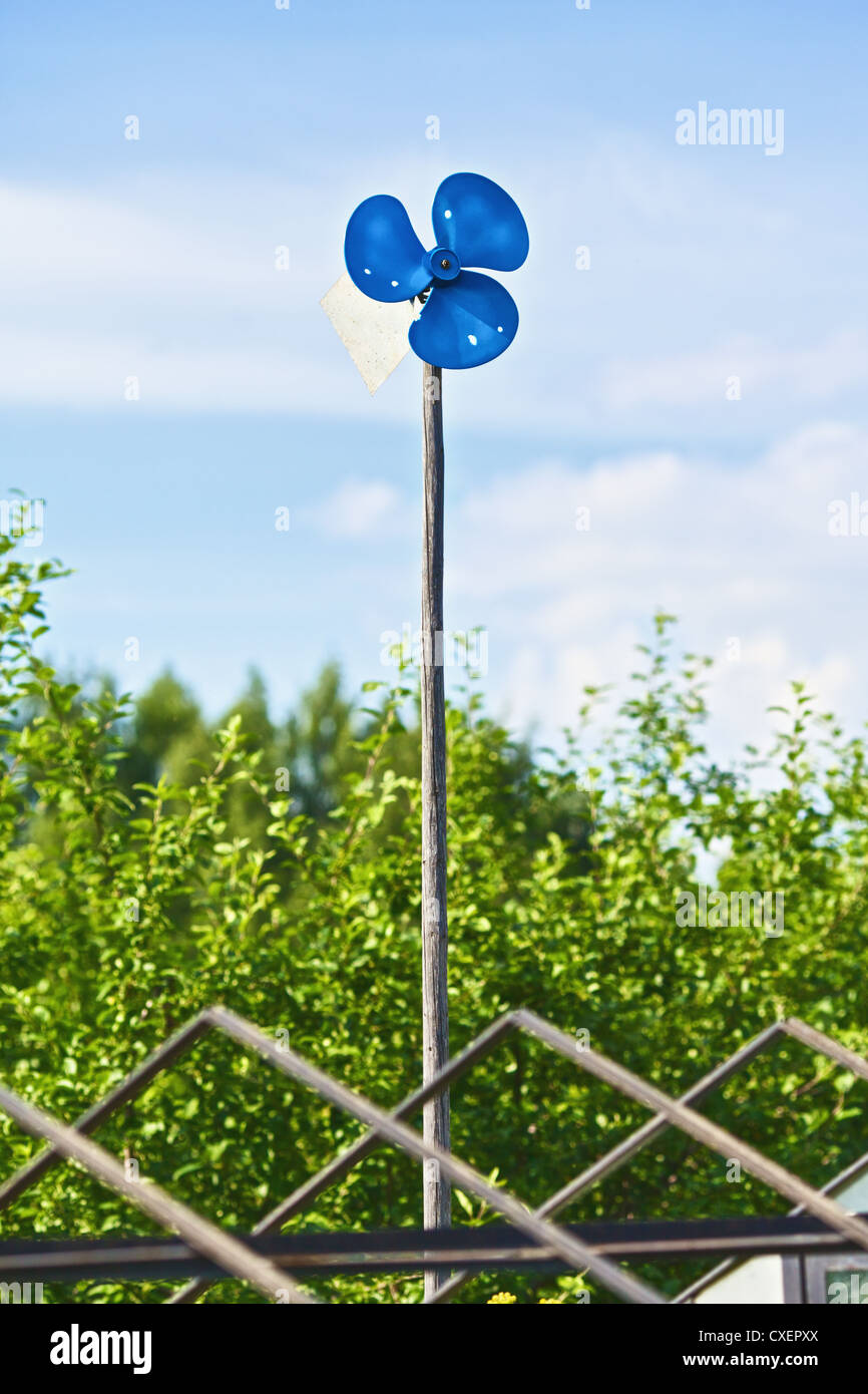 Blue Garden Windmill Stock Photo - Alamy
