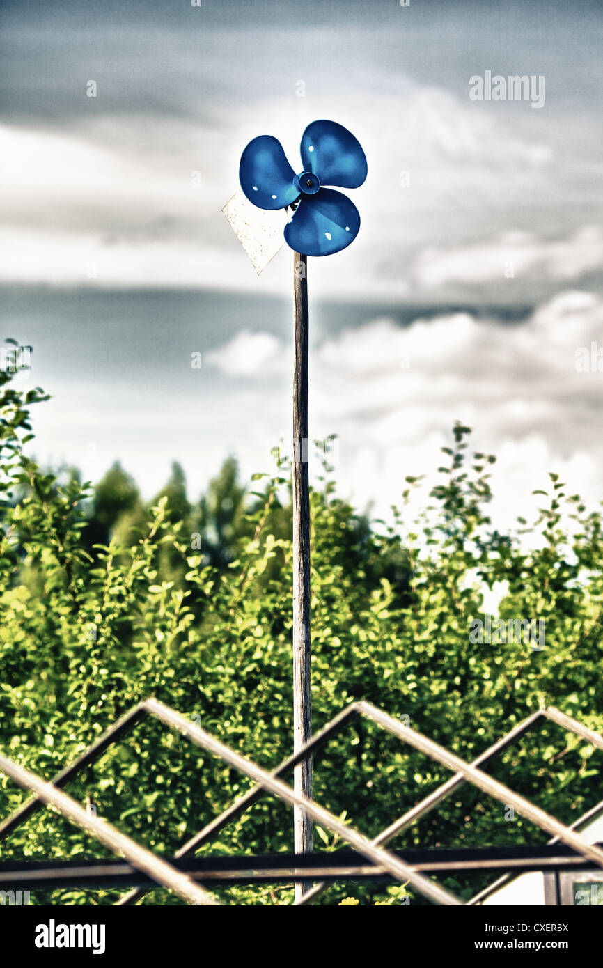 Blue Garden Windmill Stock Photo - Alamy