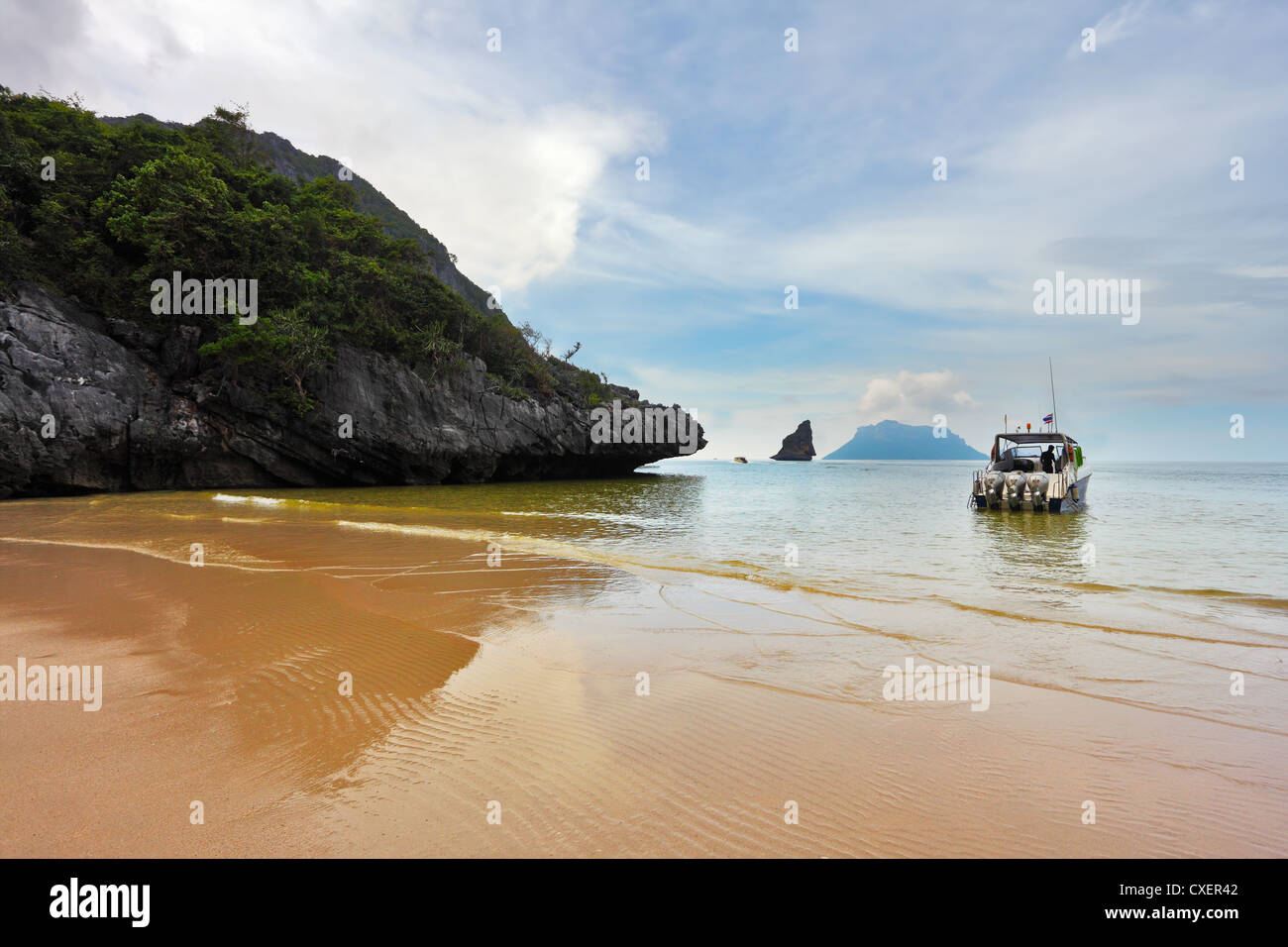 Speedboat dock on the sandy beach Stock Photo - Alamy