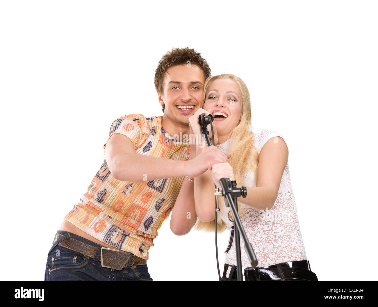 Attractive young couple singing Stock Photo - Alamy
