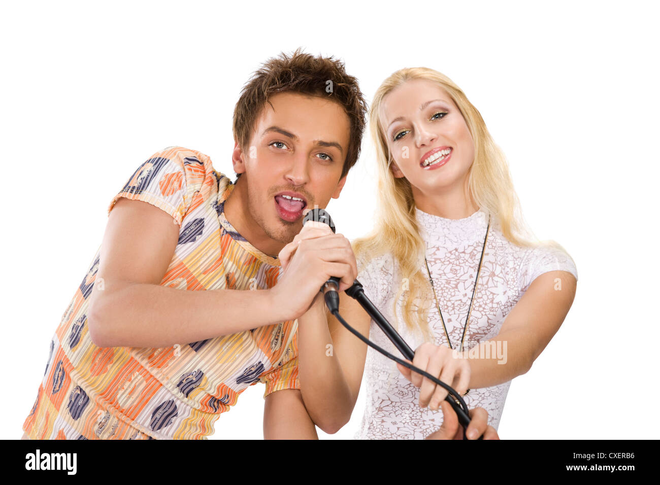 Attractive young couple singing Stock Photo - Alamy