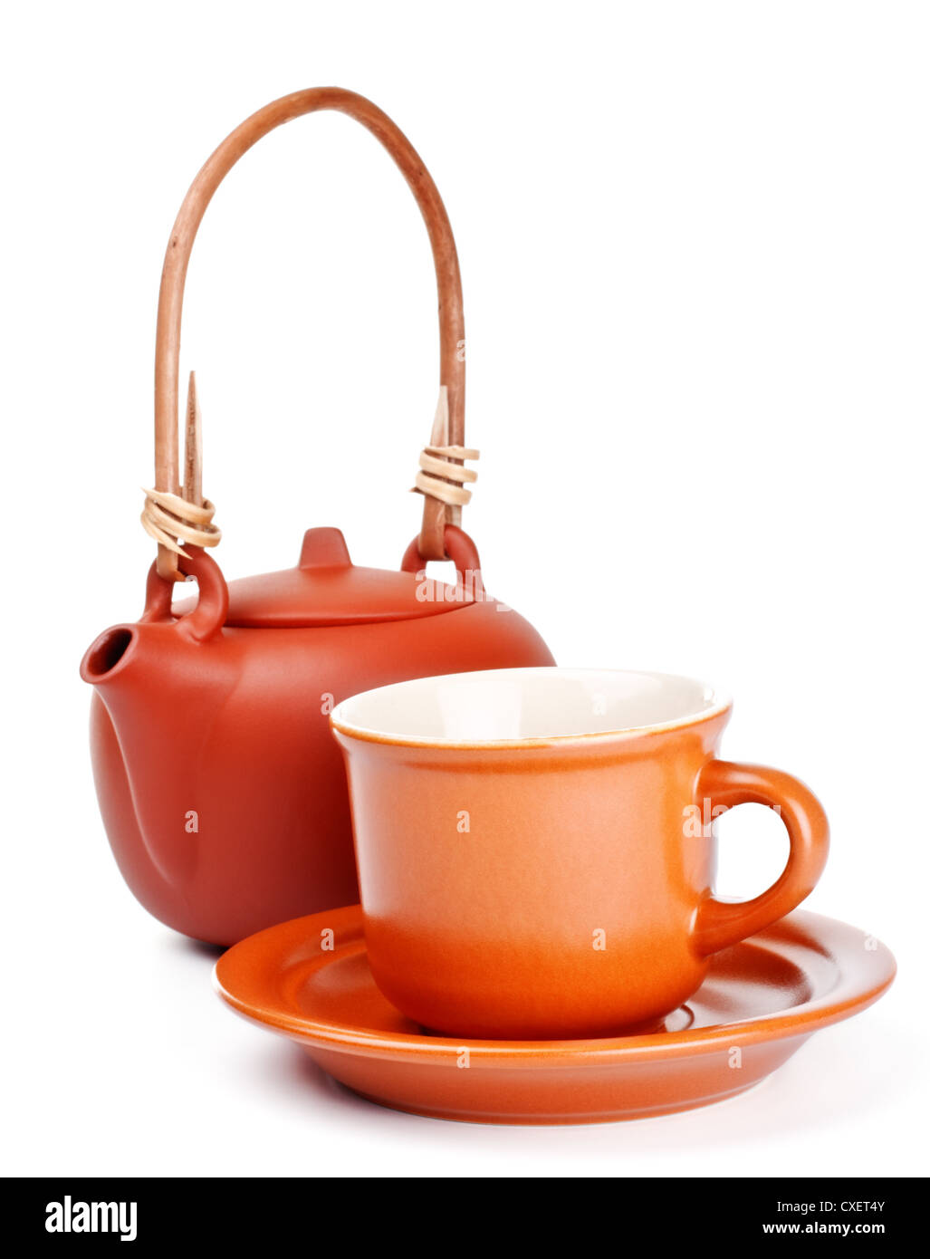 clay kettle and cup with saucer Stock Photo - Alamy