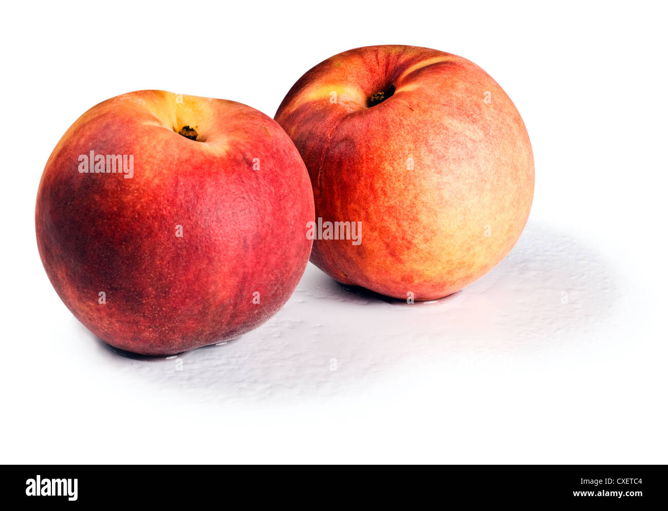 Summer fruits, two red peaches over white studio background Stock Photo ...