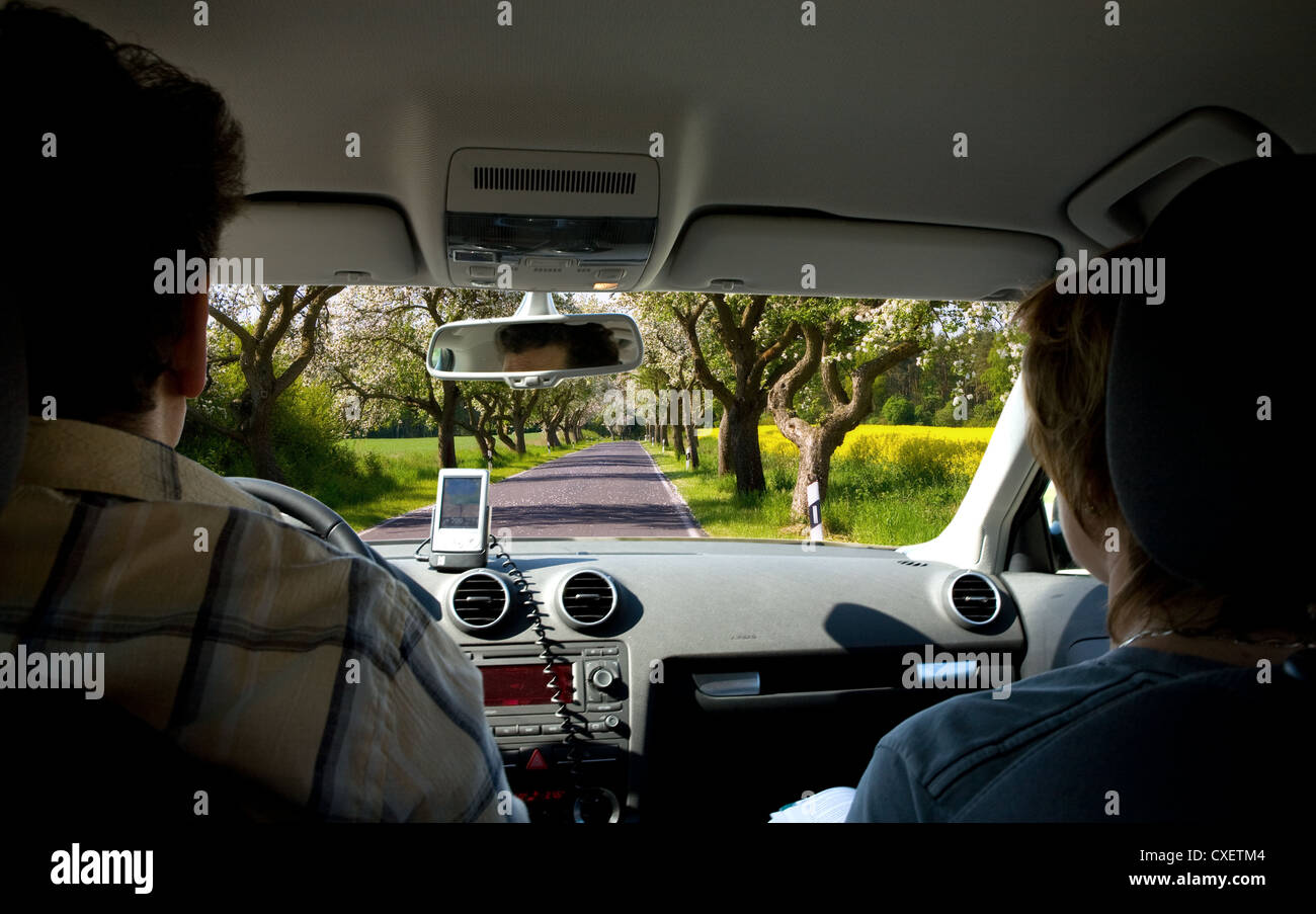 couple drive along the road Stock Photo - Alamy
