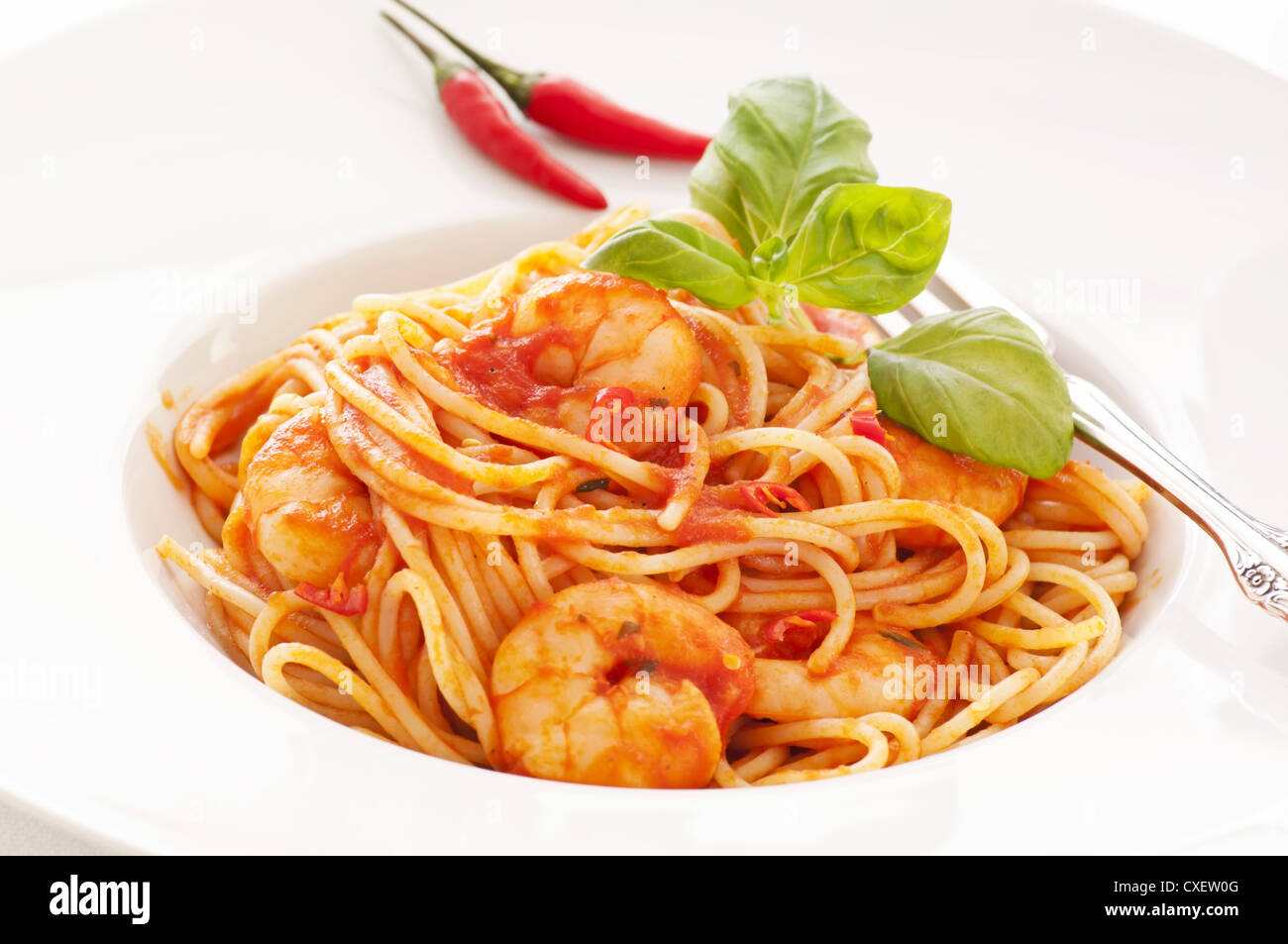 Spaghetti Diablo with prawns Stock Photo - Alamy