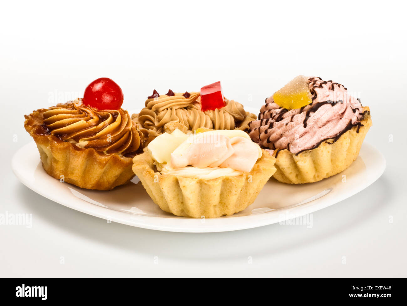 cakes on white dish Stock Photo - Alamy