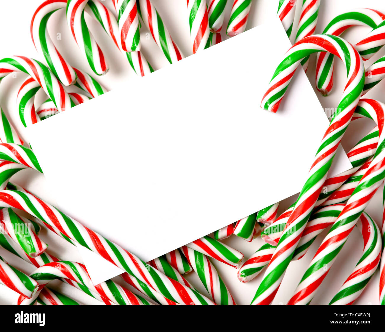 Blank note-card surrounded by red, white and green candy canes Stock ...
