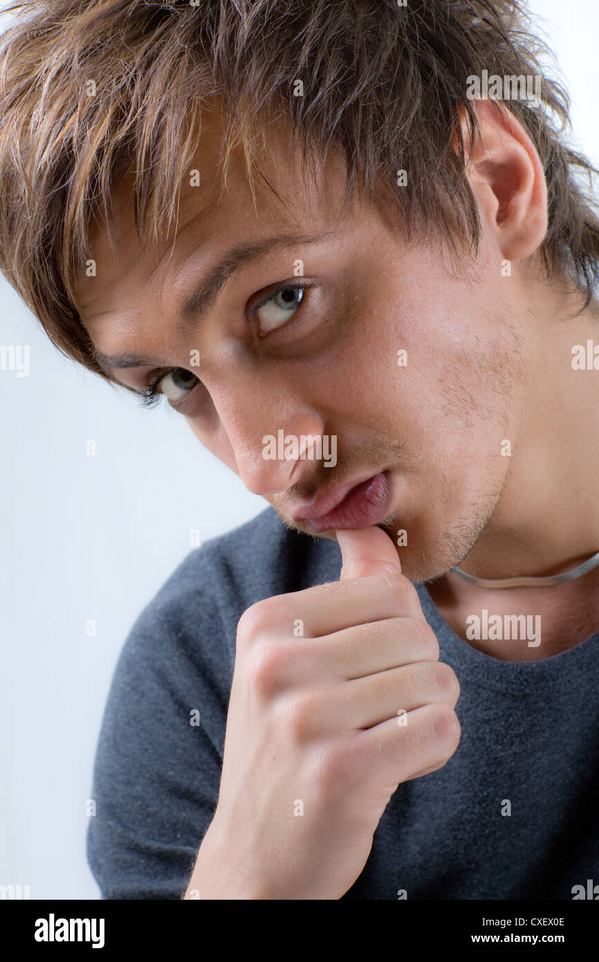 young man looking at camera Stock Photo - Alamy