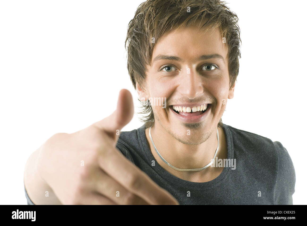 young man looking at camera Stock Photo - Alamy